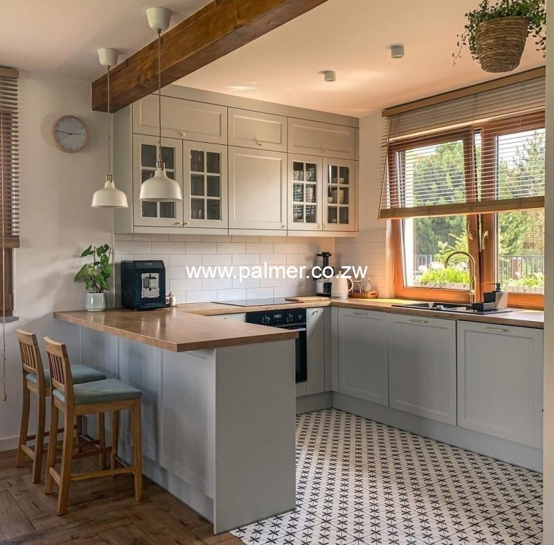 Kitchen interior design brown & white - Palmer Construction Zimbabwe